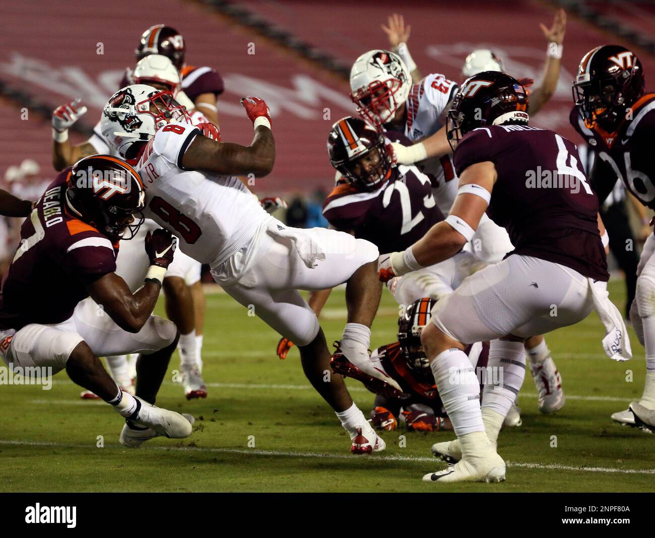 North Carolina State running back Ricky Person Jr. (8) scores a ...