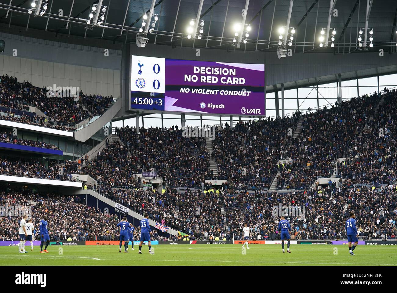 The VAR decision is displayed on a big screen for a red card shown to ...
