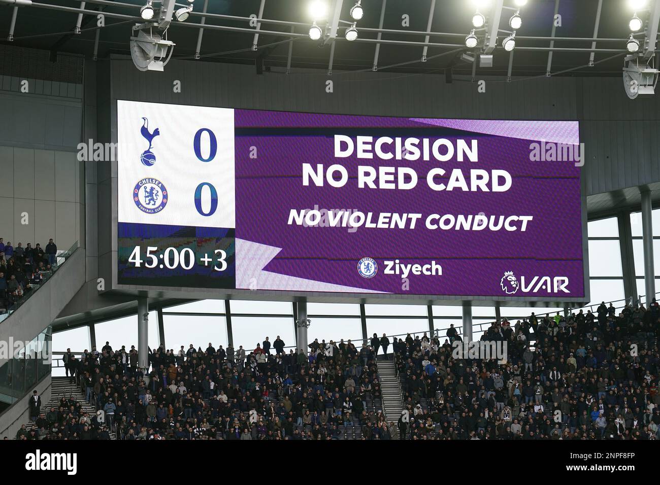 The VAR decision is displayed on a big screen for a red card shown to ...