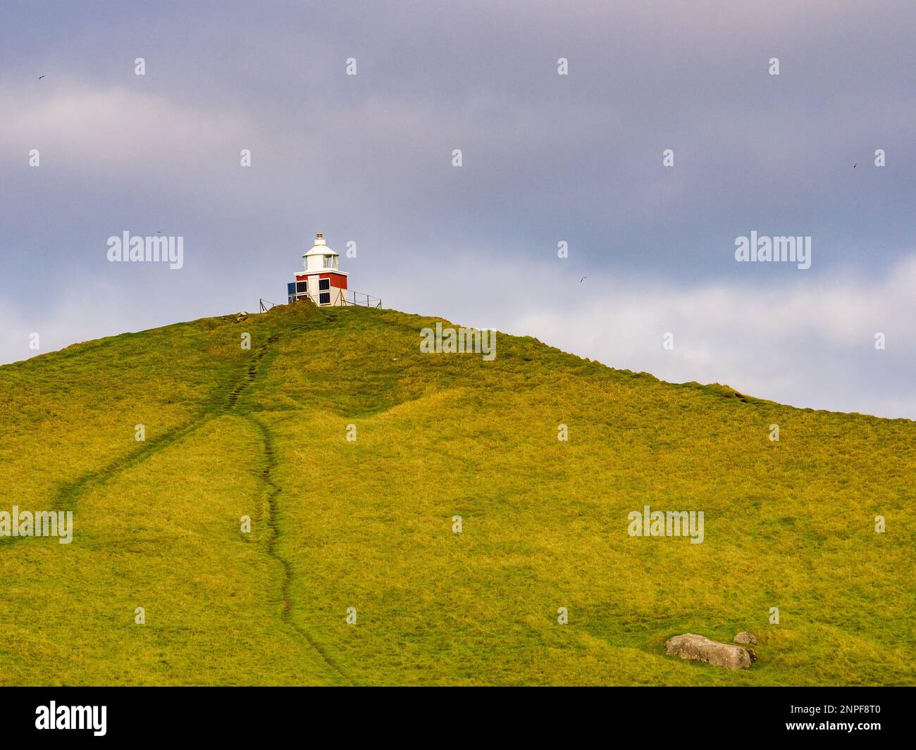 View from the trail on the island of Kalsoy to the Kallur lighthouse ...