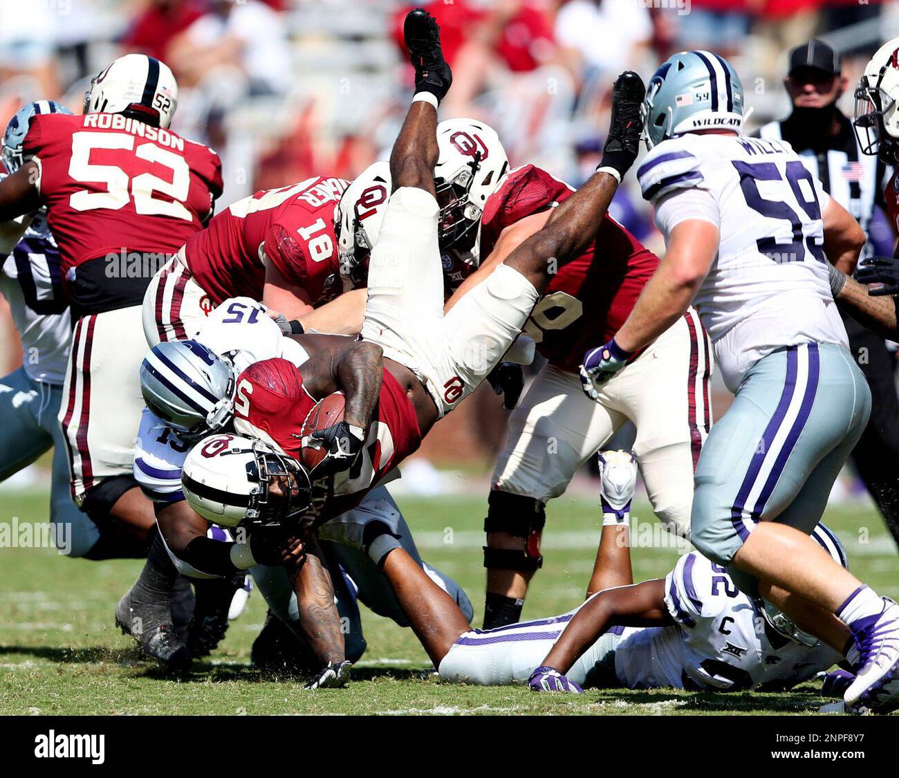 Kansas State defensive tackle Robert Hentz II (15) tackles Oklahoma ...