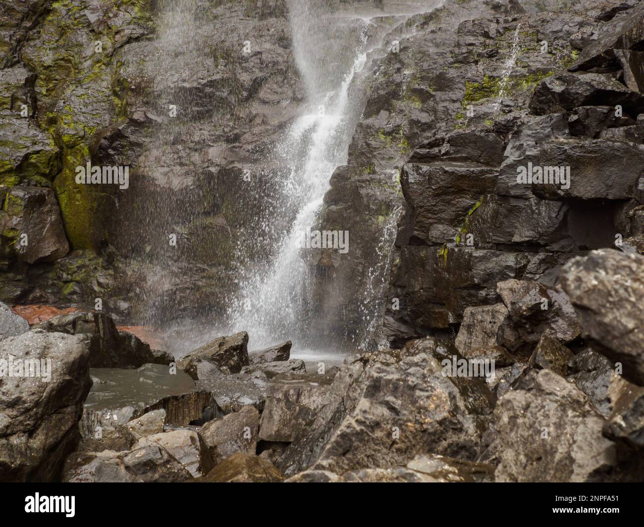 Close up for waterfall Fossa (Fossá) during strong wind in rainy ...