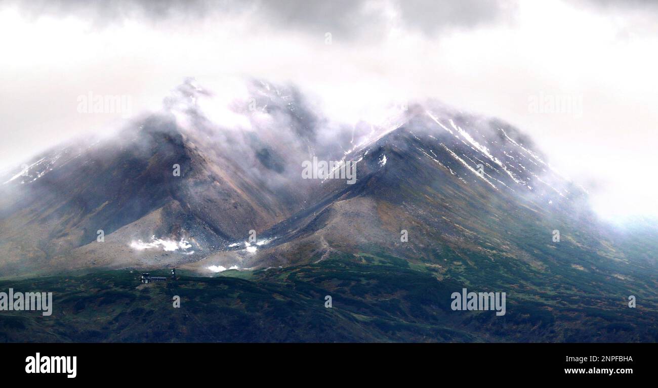 The first snow is observed on Mt. Asahi (Asahi-dake) in Higashikawa ...