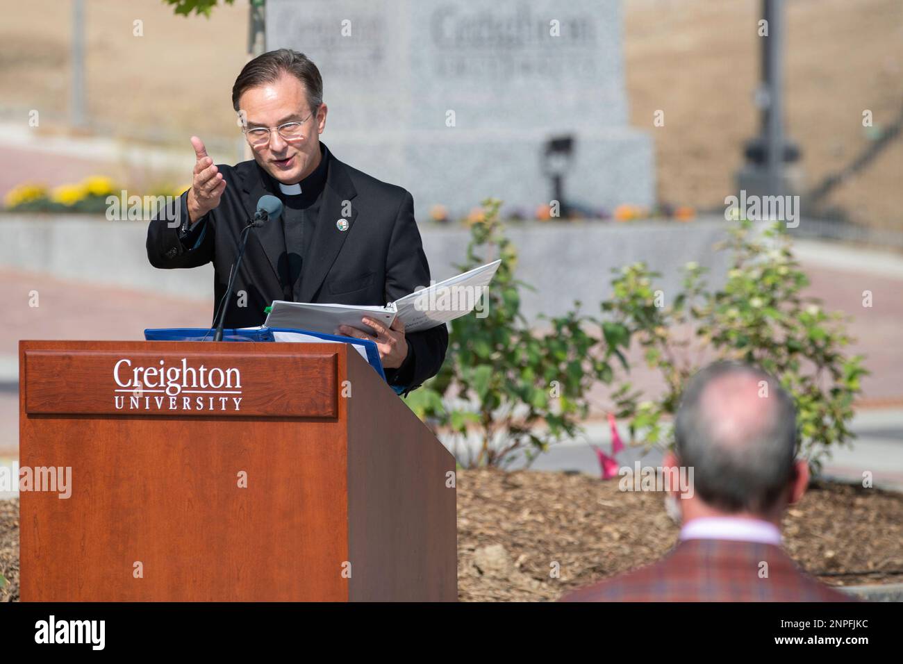 Reverend Daniel Hendrickson, president of Creighton University, speaks ...