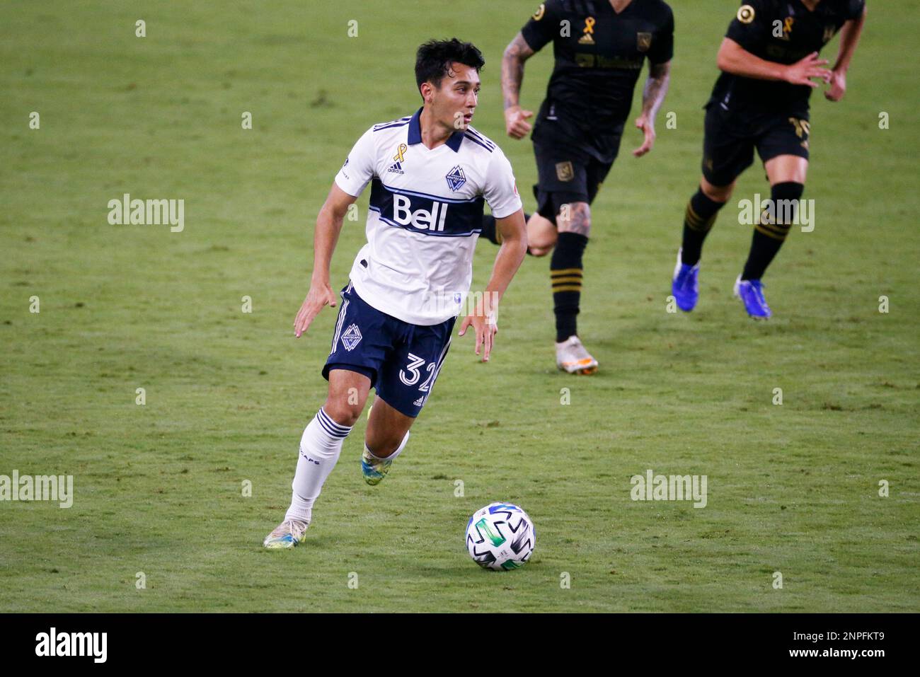 Vancouver Whitecaps midfielder Patrick Metcalfe (32) in actions against Los Angeles FC during ...