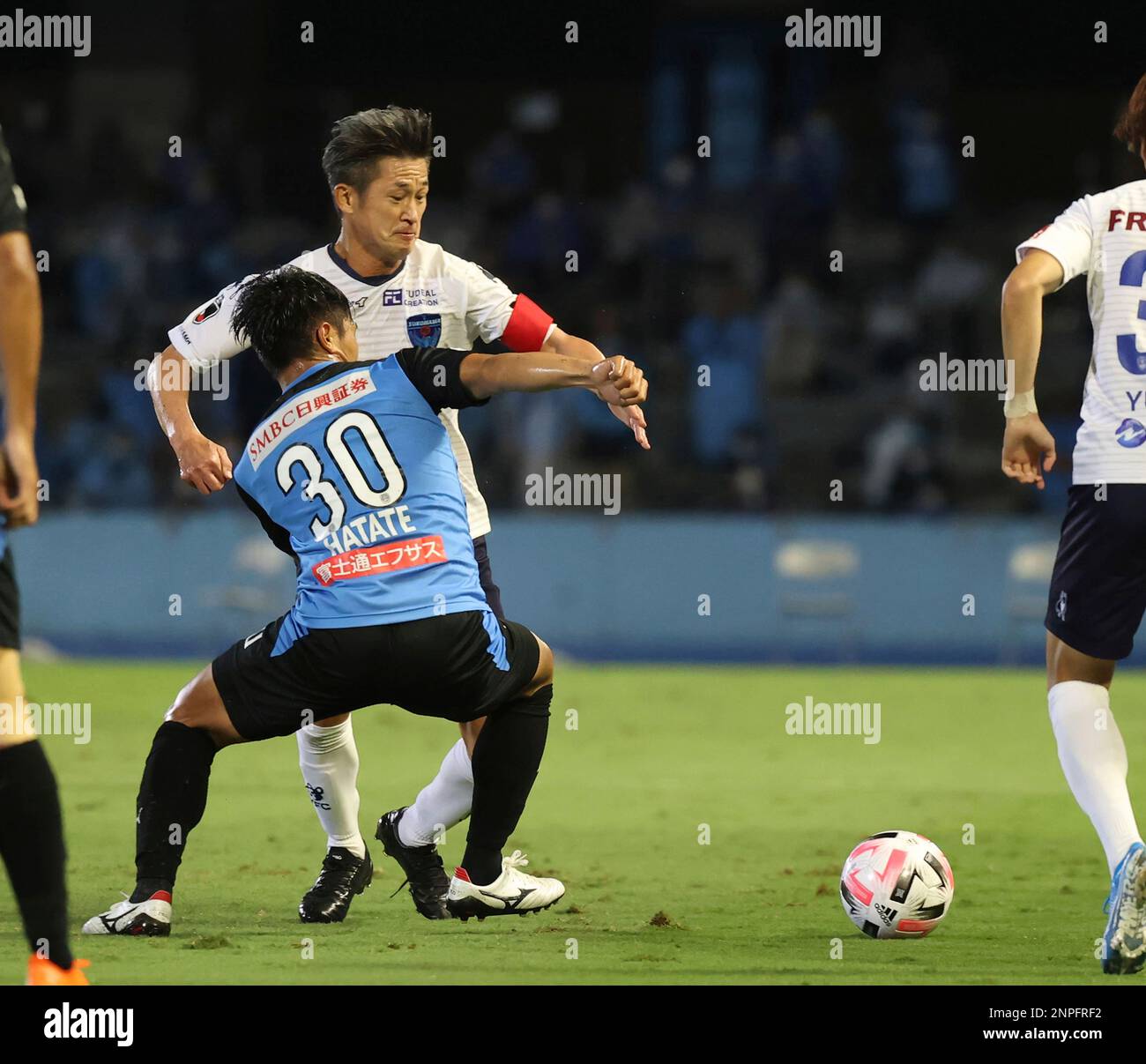 53-year-old Japanese footballer Kazuyoshi Miura (wearing a red captain armband , 11), known as ...