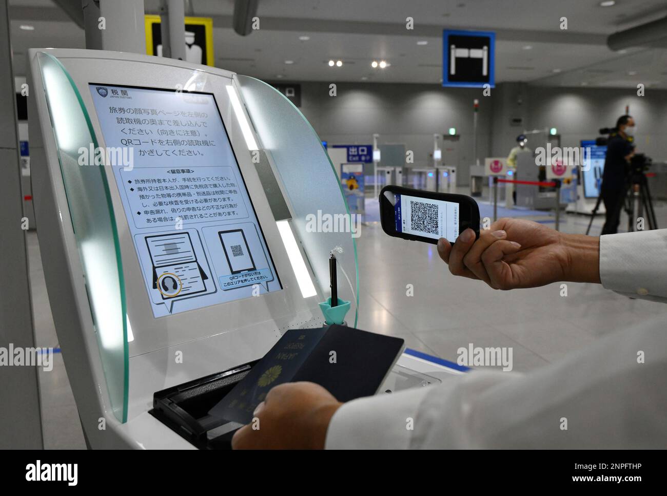 A customs officer demonstrates to use an Electronic Customs Declaration ...