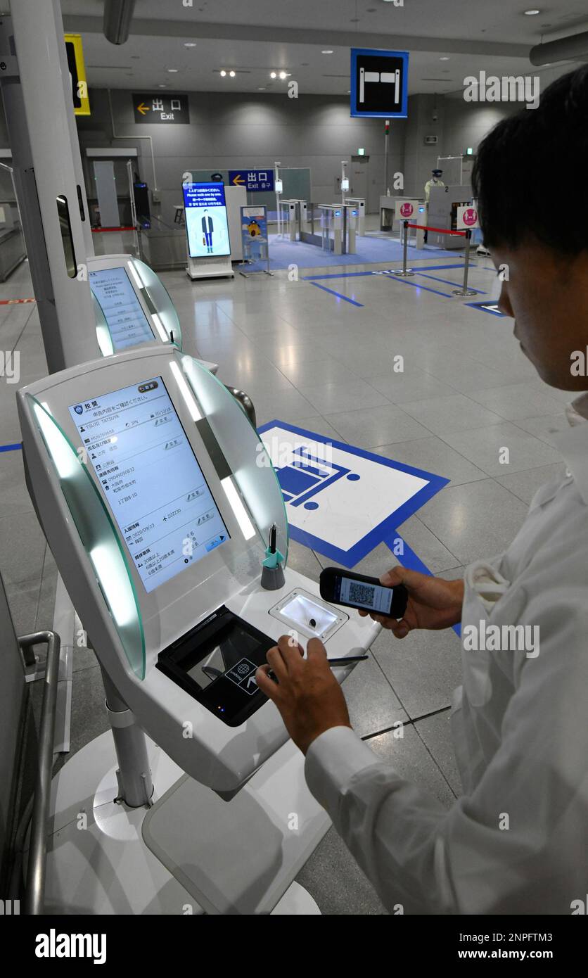 A customs officer demonstrates to use an Electronic Customs Declaration ...