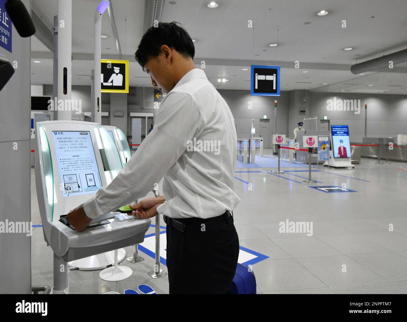 A customs officer demonstrates to use an Electronic Customs Declaration ...
