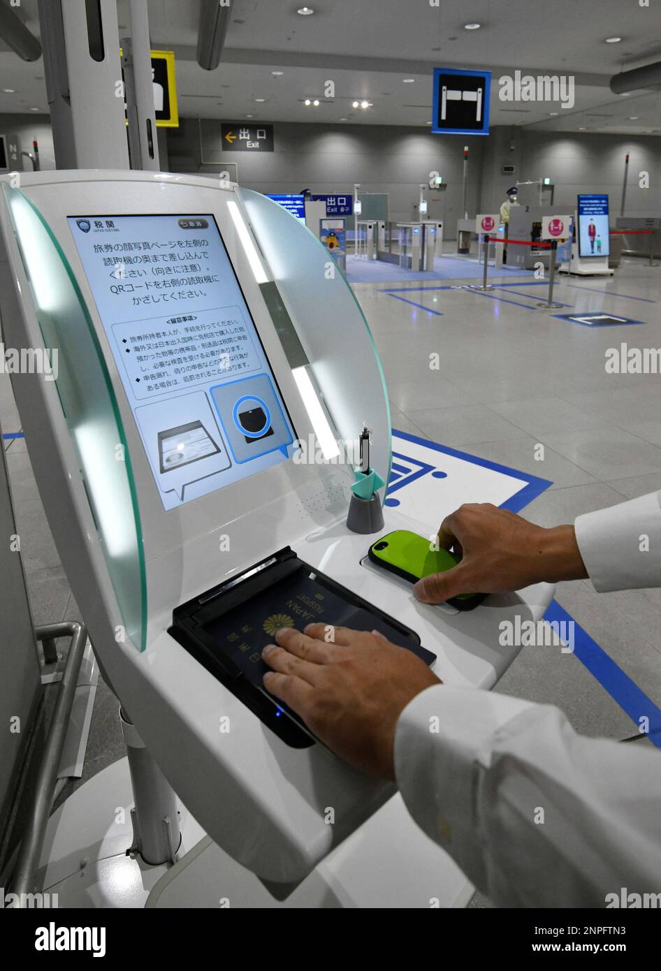 A customs officer demonstrates to use an Electronic Customs Declaration ...