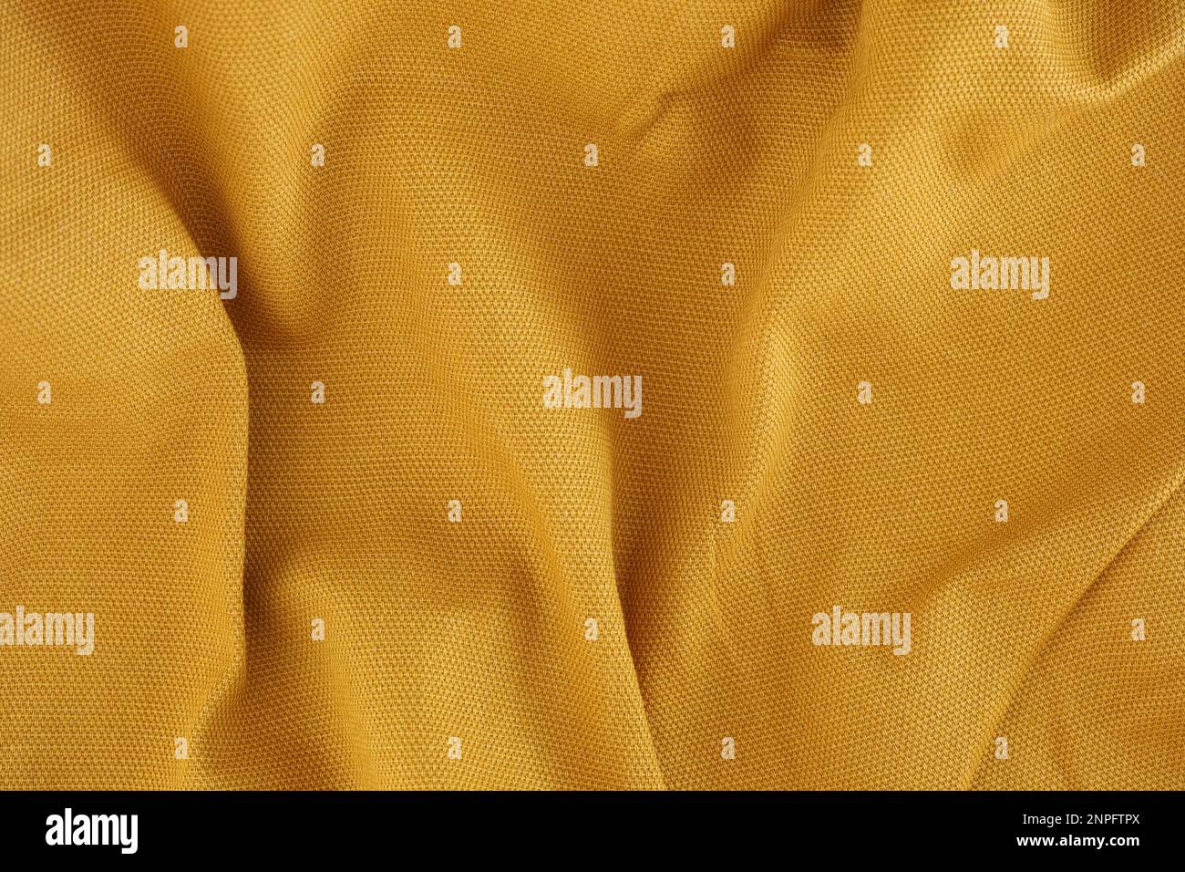 A yellow crumpled fabric texture background. Close up Stock Photo - Alamy