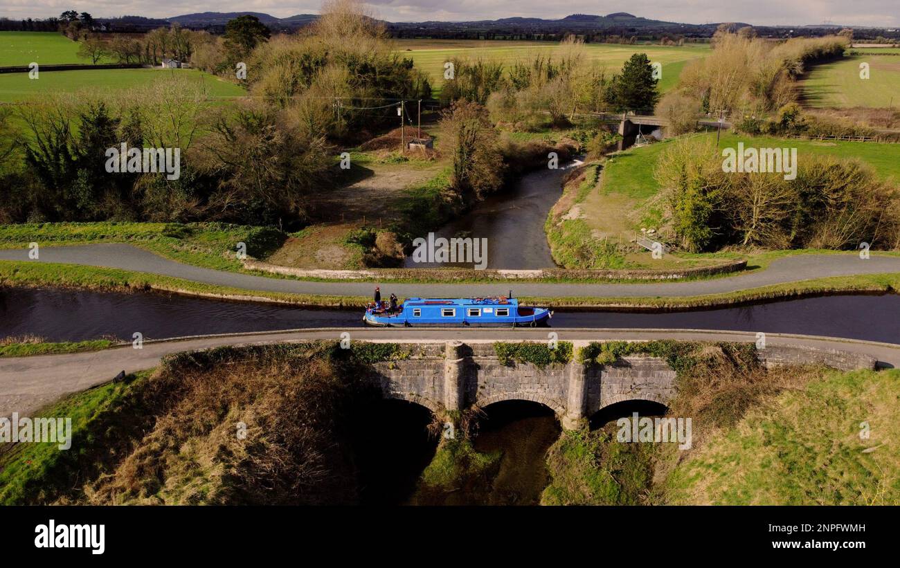A barge makes its way across Vicarstown aqueduct on the Grand Canal ...