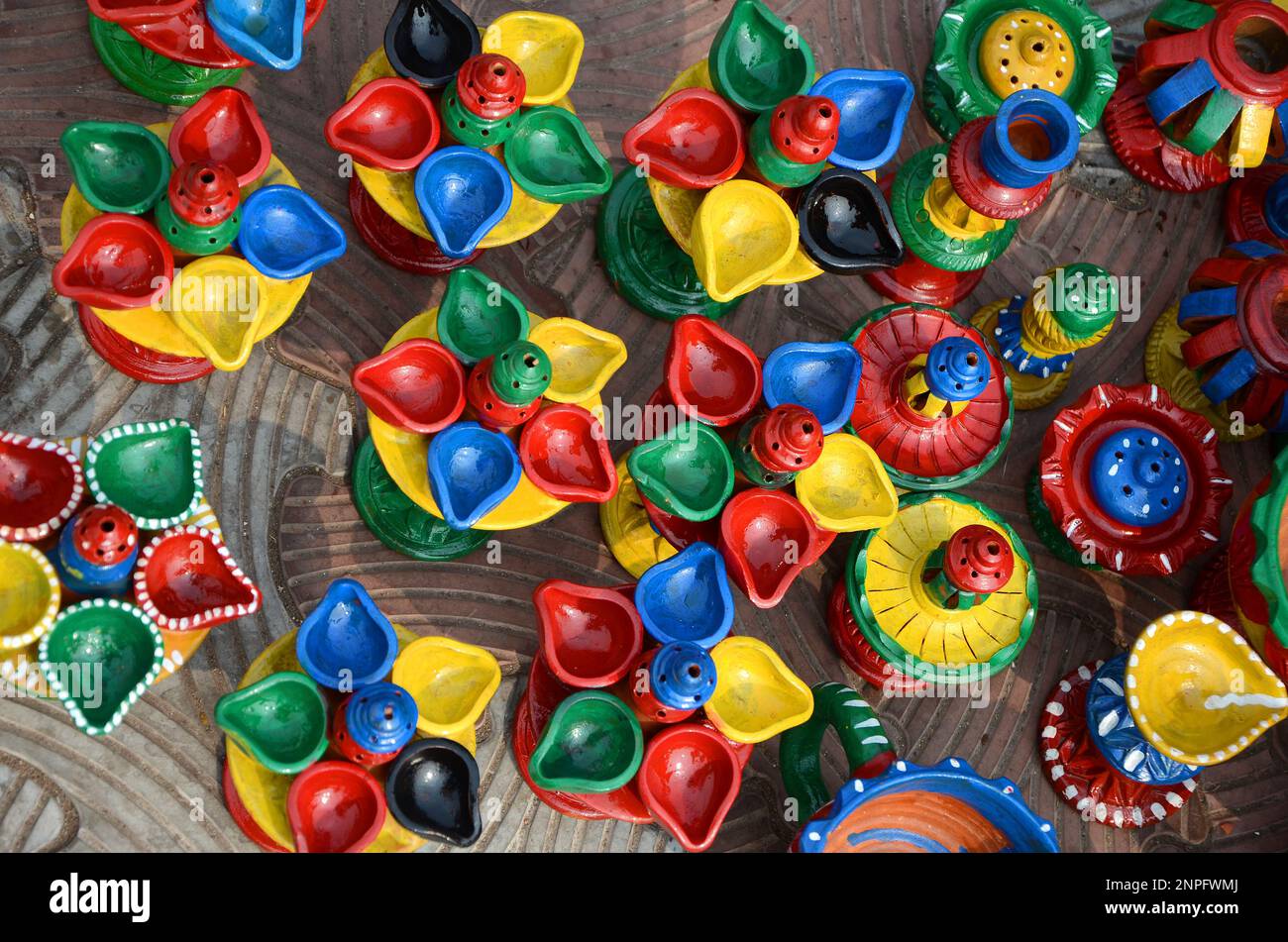 The Bengali rural artists were making hand painting on the selling ...