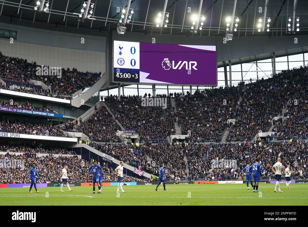 A VAR check is displayed on a big screen during the Premier League ...