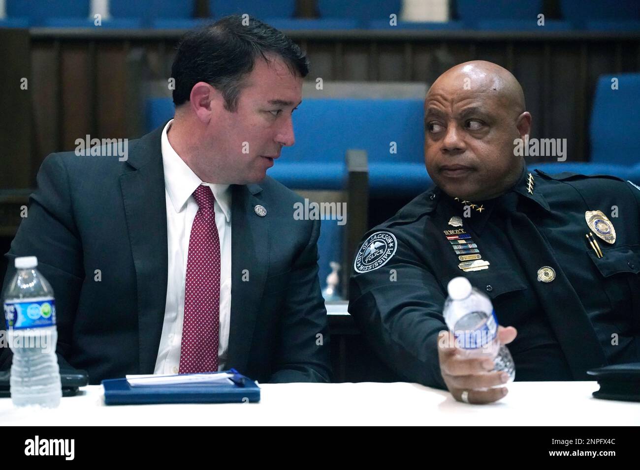 Mississippi Public Safety Commissioner Sean Tindell, left, confers with ...