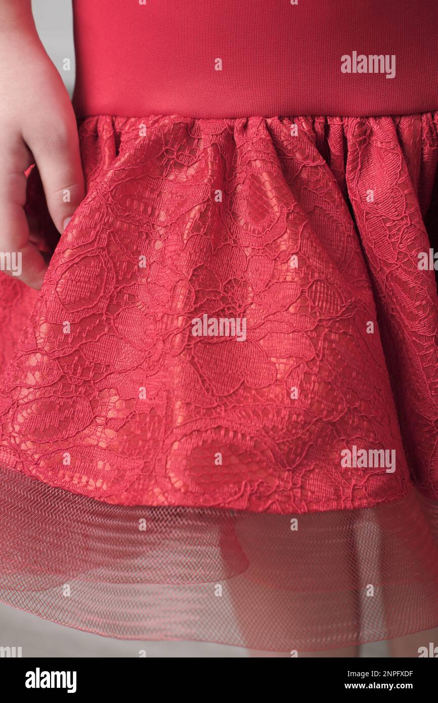 details of red lace girl's party dress, cropped view, festive dress for ...