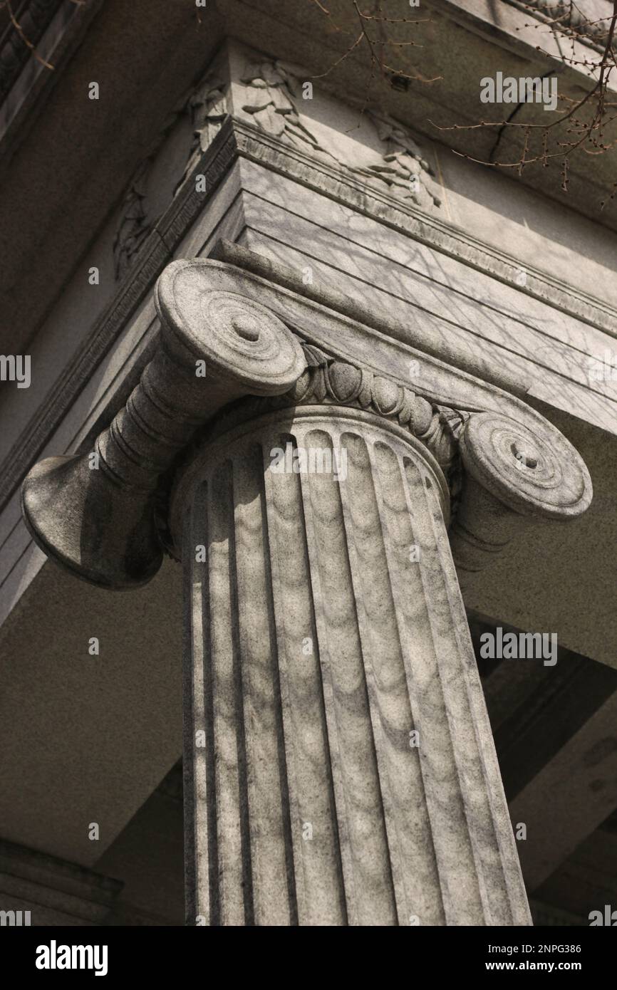 A traditional classical Greek column and scroll capital Stock Photo - Alamy