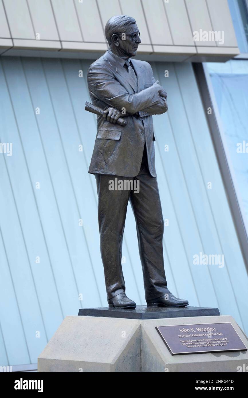 A statue of UCLA Bruins former coach John Wooden at Pauley Pavilion ...