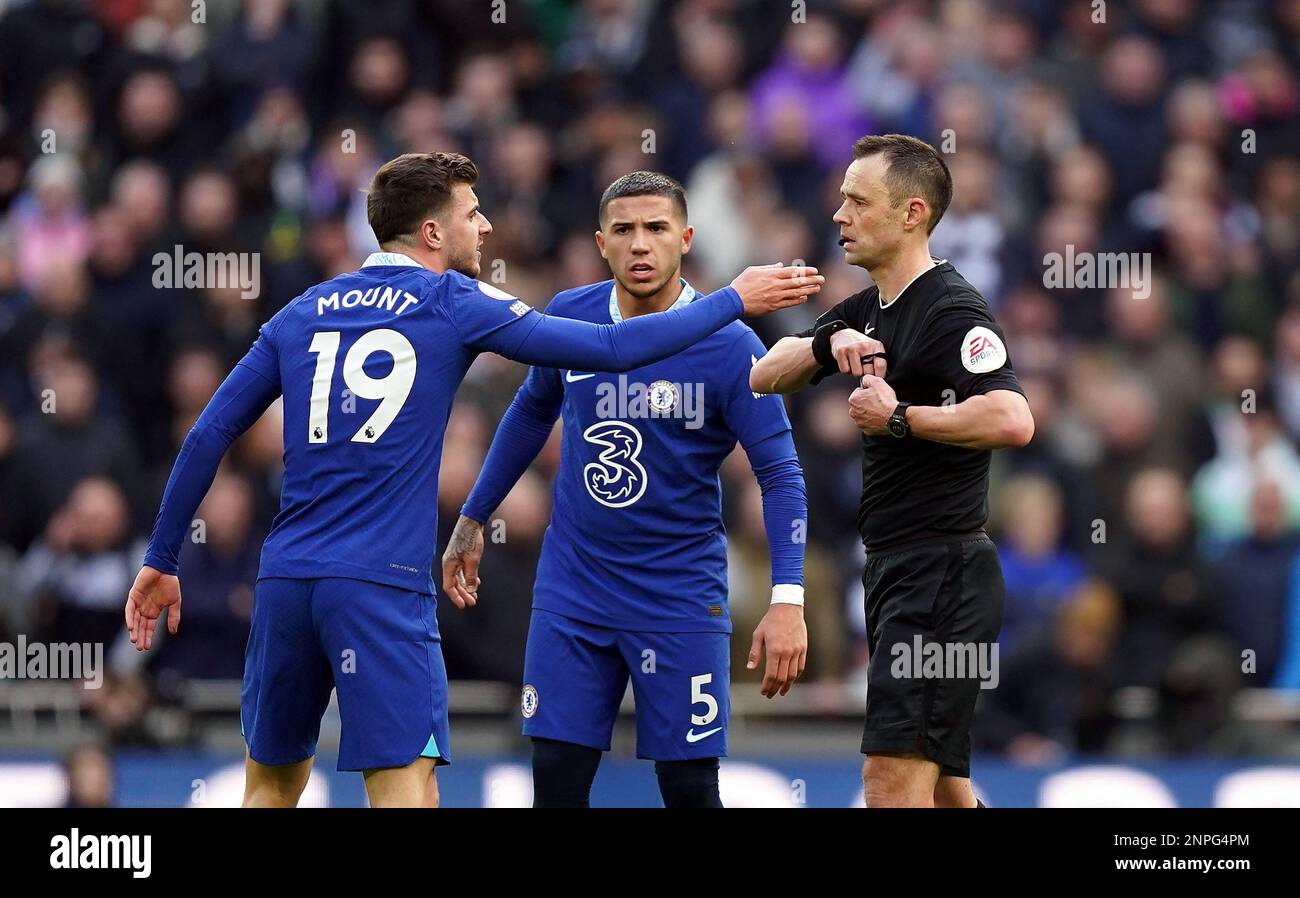 Referee Stuart Attwell shows a yellow card to Chelsea’s Mason Mount ...