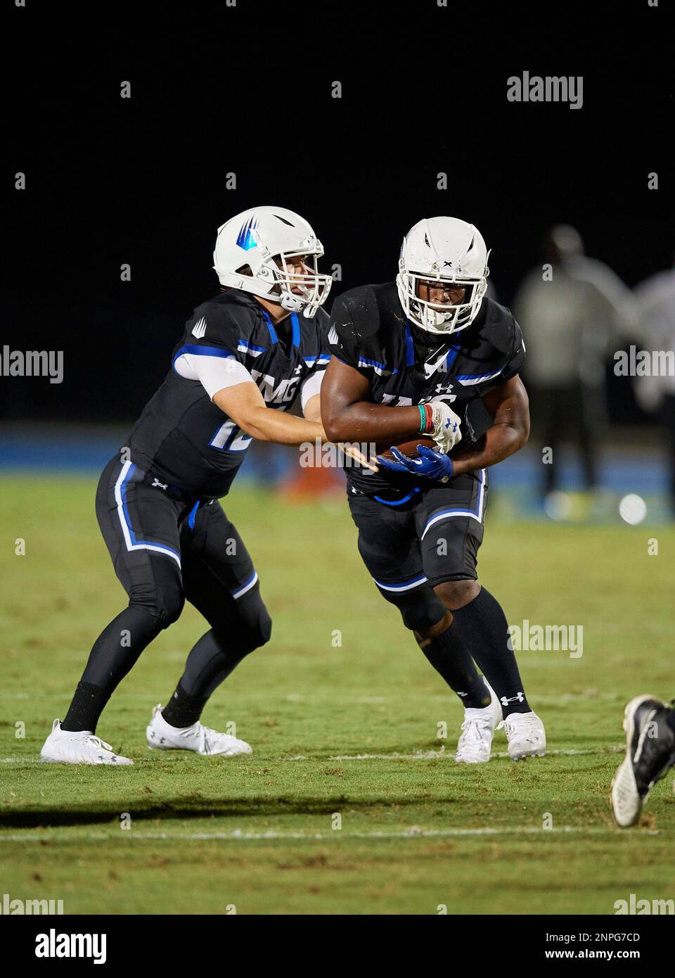 IMG Ascenders running back Kaytron Allen (7) takes a handoff from ...