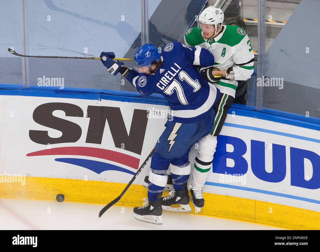 Dallas Stars defenseman John Klingberg (3) is checked by Tampa Bay ...