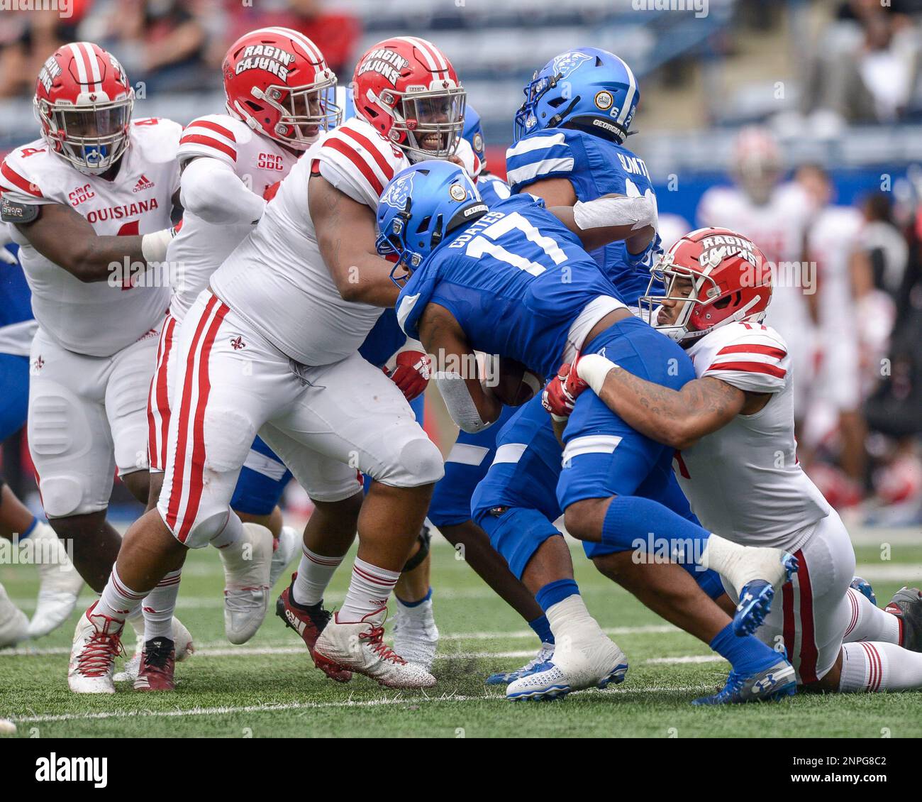 Georgia State running back Destin Coates (17) is brought down by the ...