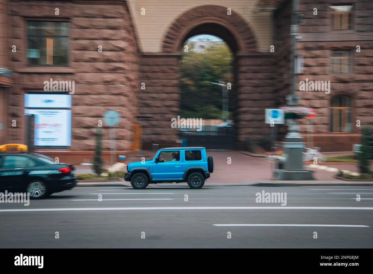 Ukraine, Kyiv - 2 August 2021: Light Blue Suzuki Jimny car moving on ...