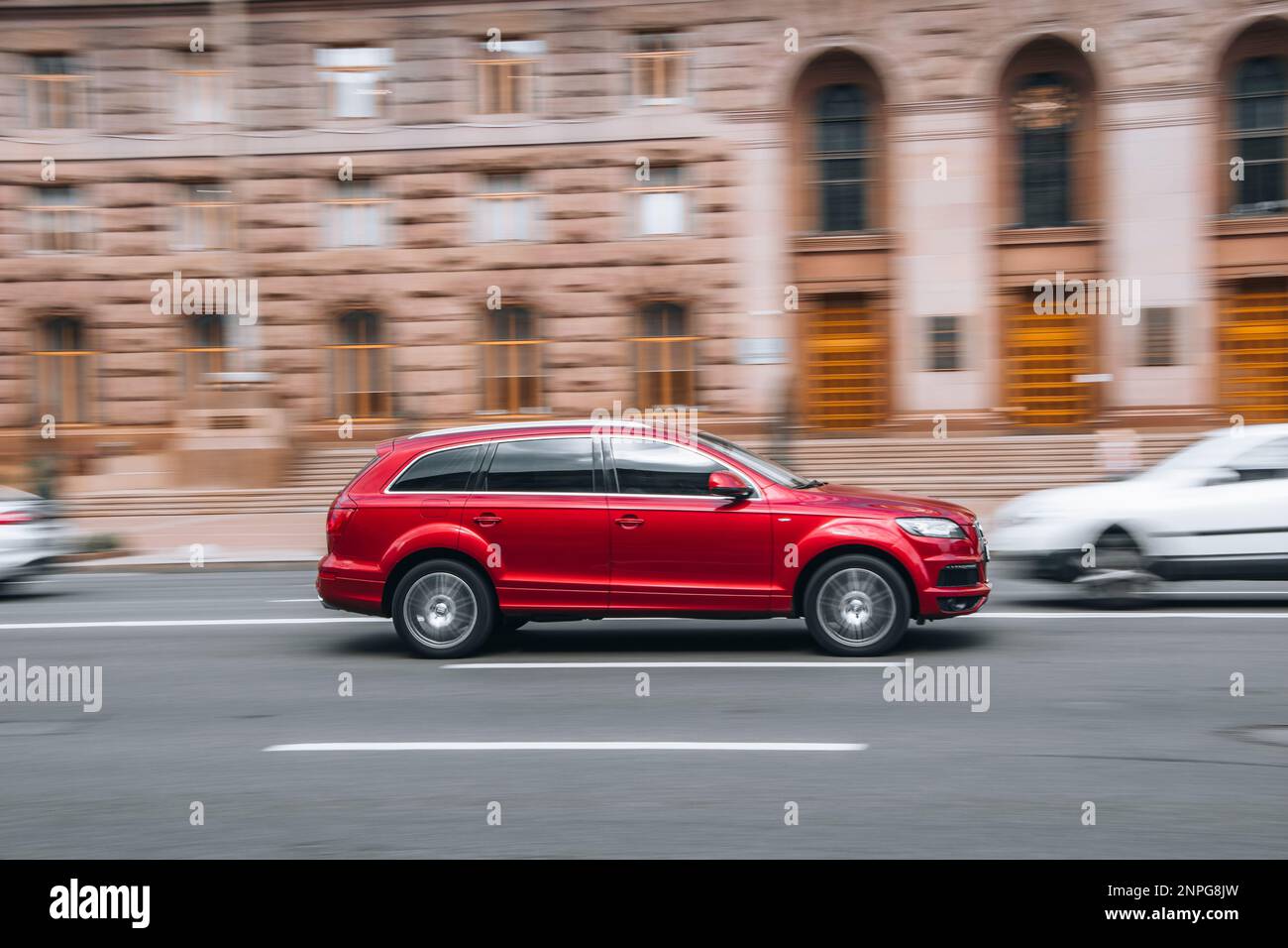 Ukraine, Kyiv - 2 August 2021: Red Audi Q7 car moving on the street ...