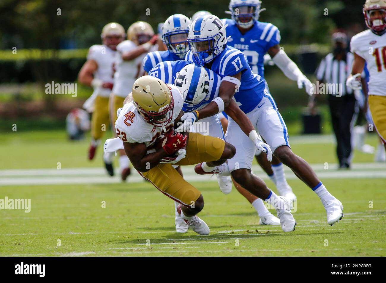 Boston College running back Travis Levy (23) is tackled by Duke ...