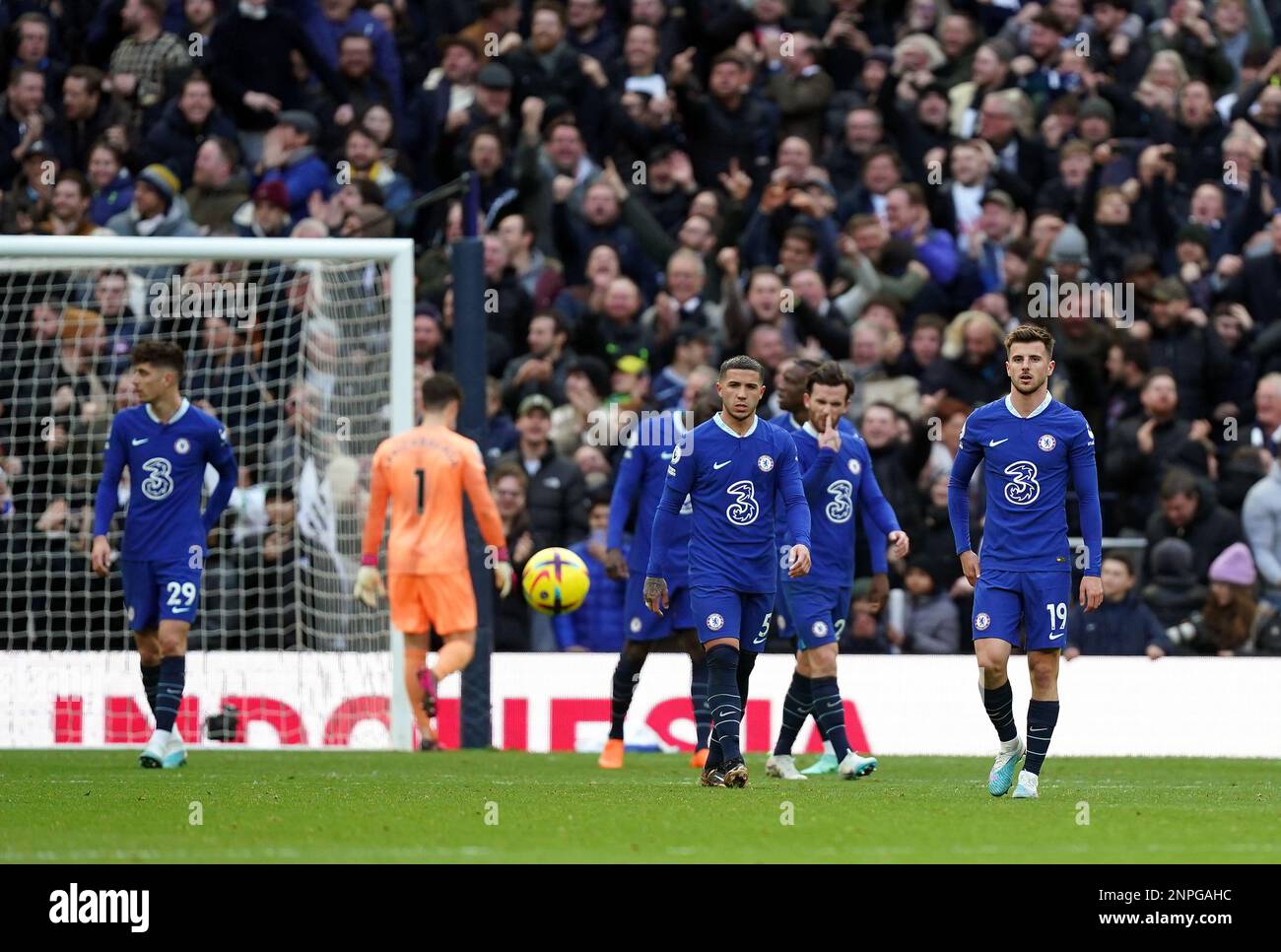Chelsea players appear dejected after they concede a second goal during ...