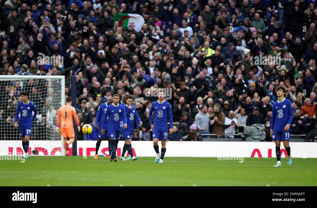 Chelsea players appear dejected after they concede a second goal during ...