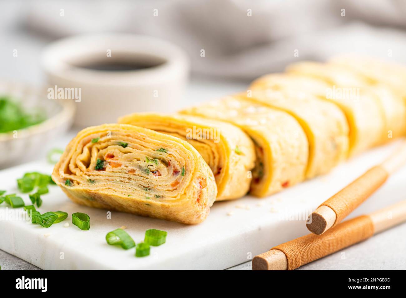 Tamagoyaki, Japanese rolled omelette, on a ceramic plate Stock Photo ...
