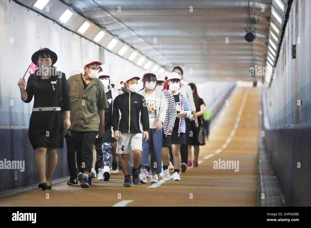 A group of students attend a school excursion at Kanmon Tunne, an ...