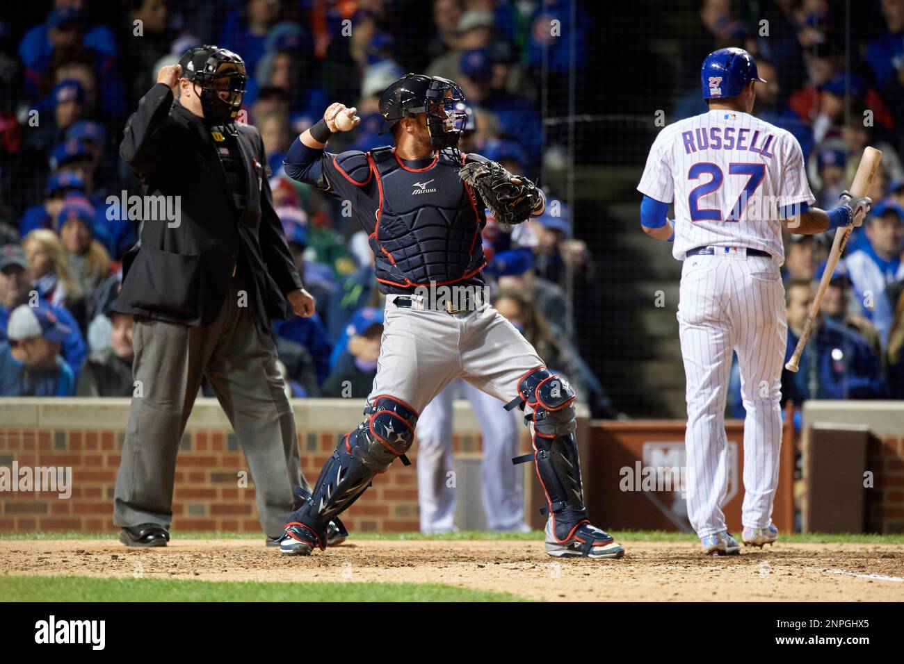 Umpire Tony Randazzo makes the call as Cleveland Indians catcher Yan ...