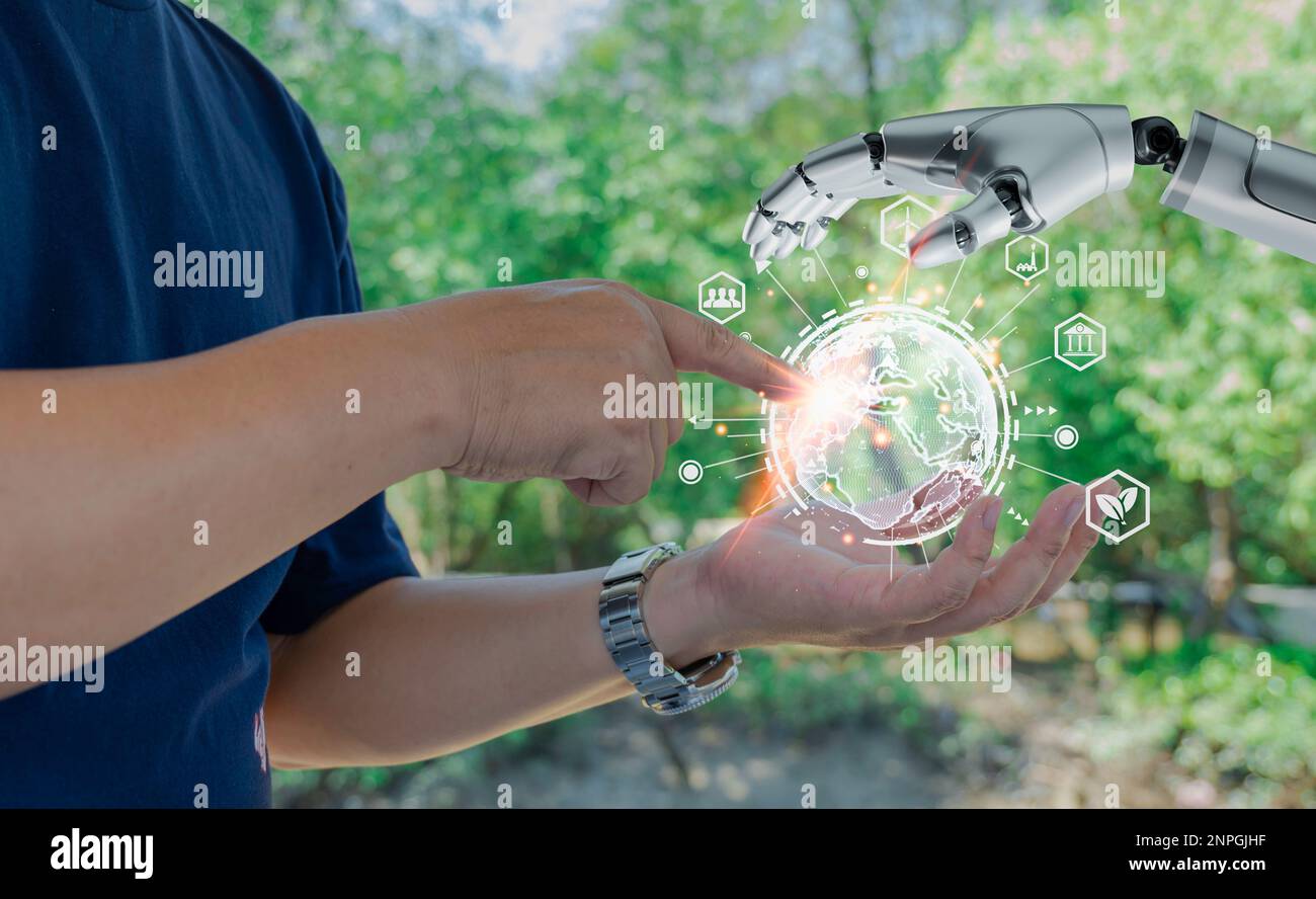 Robot and human hand with flash light with modern interface icons ...