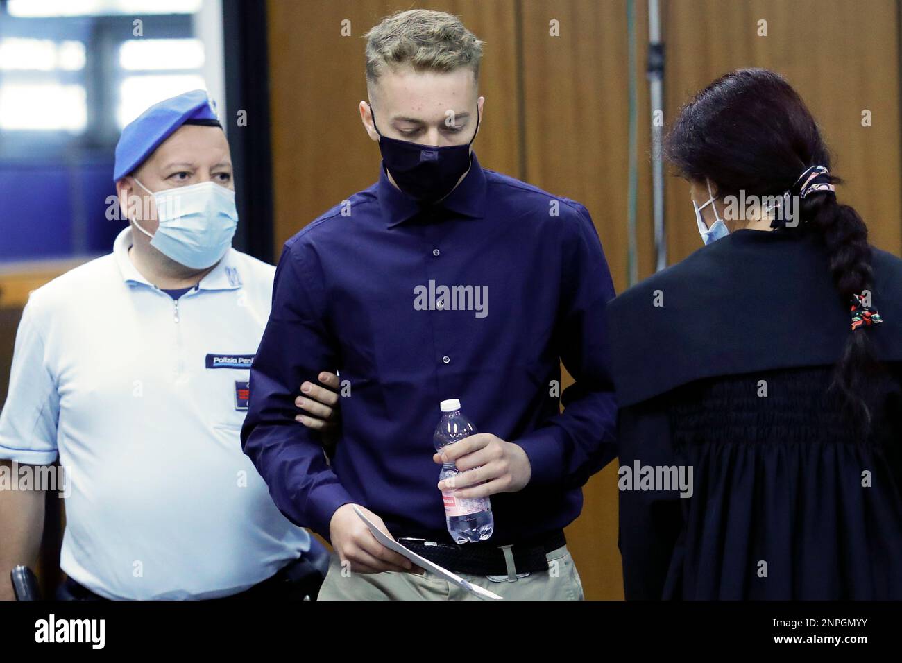 Finnegan Lee Elder, from California, is escorted in court for a hearing ...