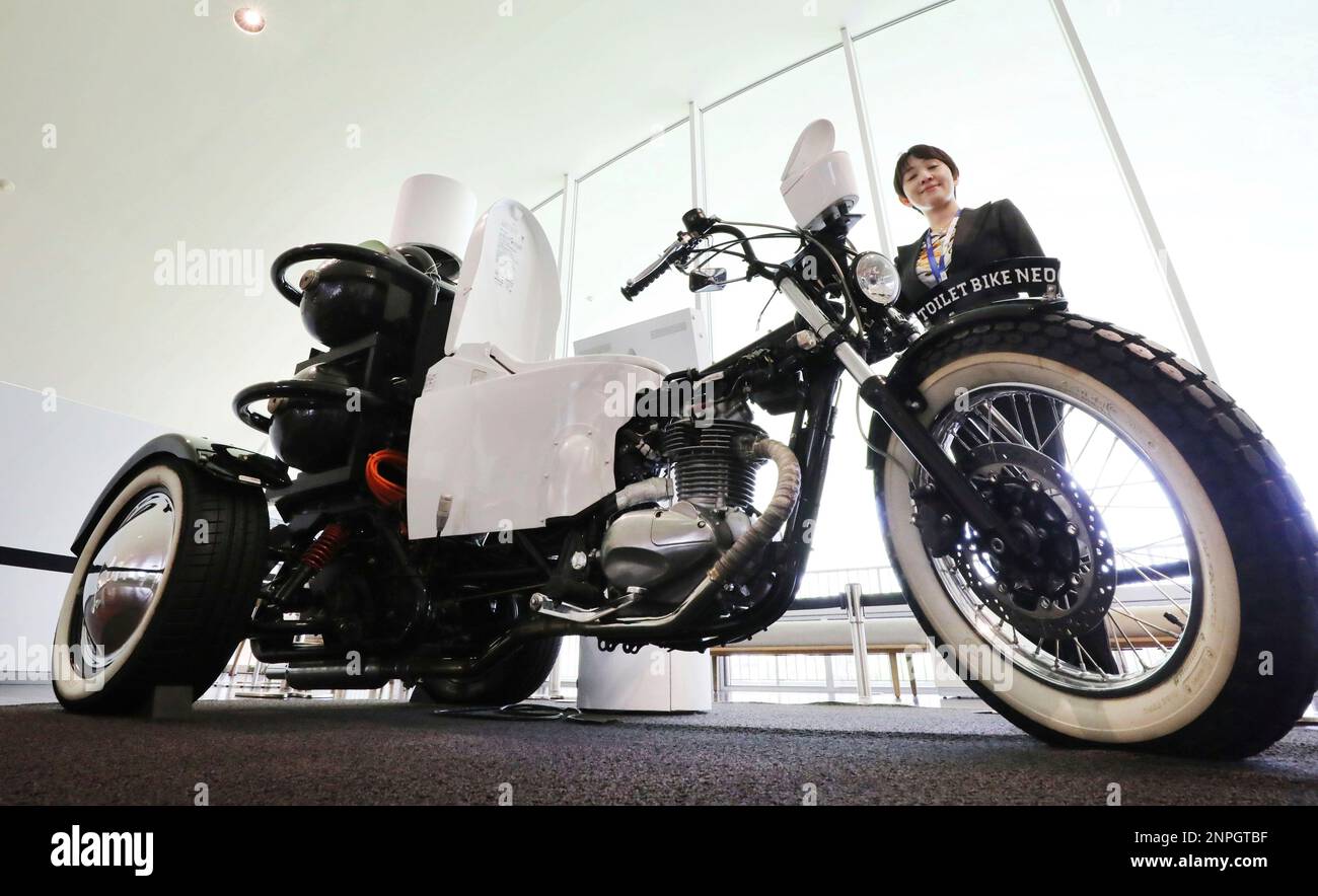 A photo shows "TOTO Toilet Bike NEO" at a museum near the headquarters ...