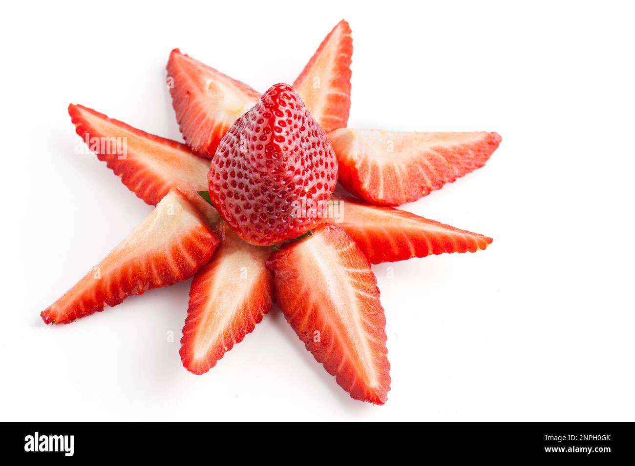 Sliced strawberries to form a star - isolated white background Stock ...