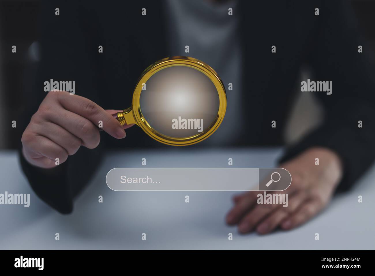 Concept of searching data networking and internet, Businesswoman wearing a suit holding a ...