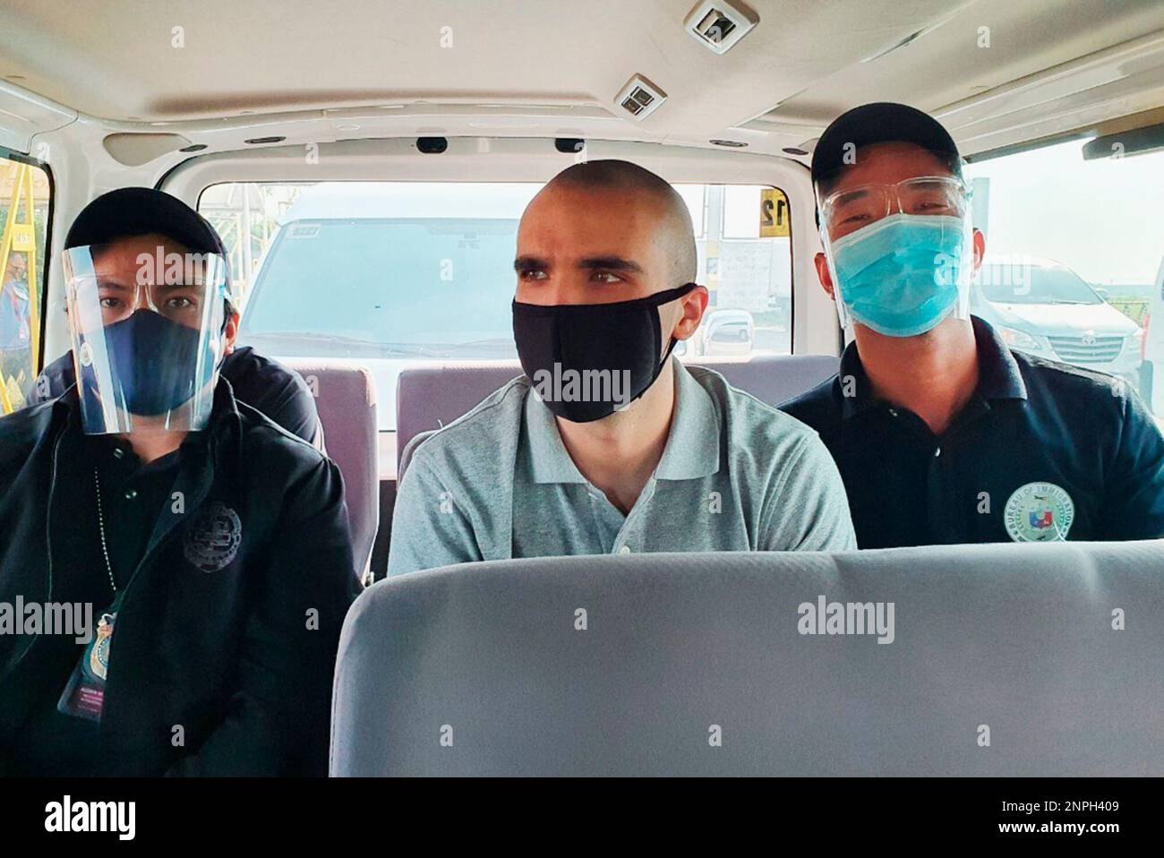 In this photo provided by the Philippines' Bureau of Immigration, U.S ...