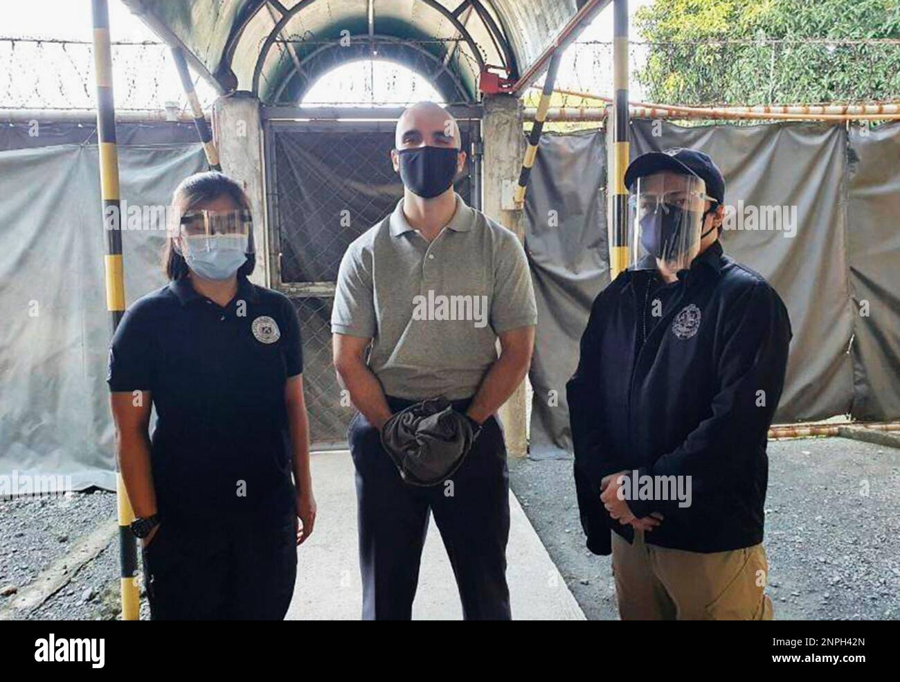 In this photo provided by the Philippines' Bureau of Immigration, U.S ...