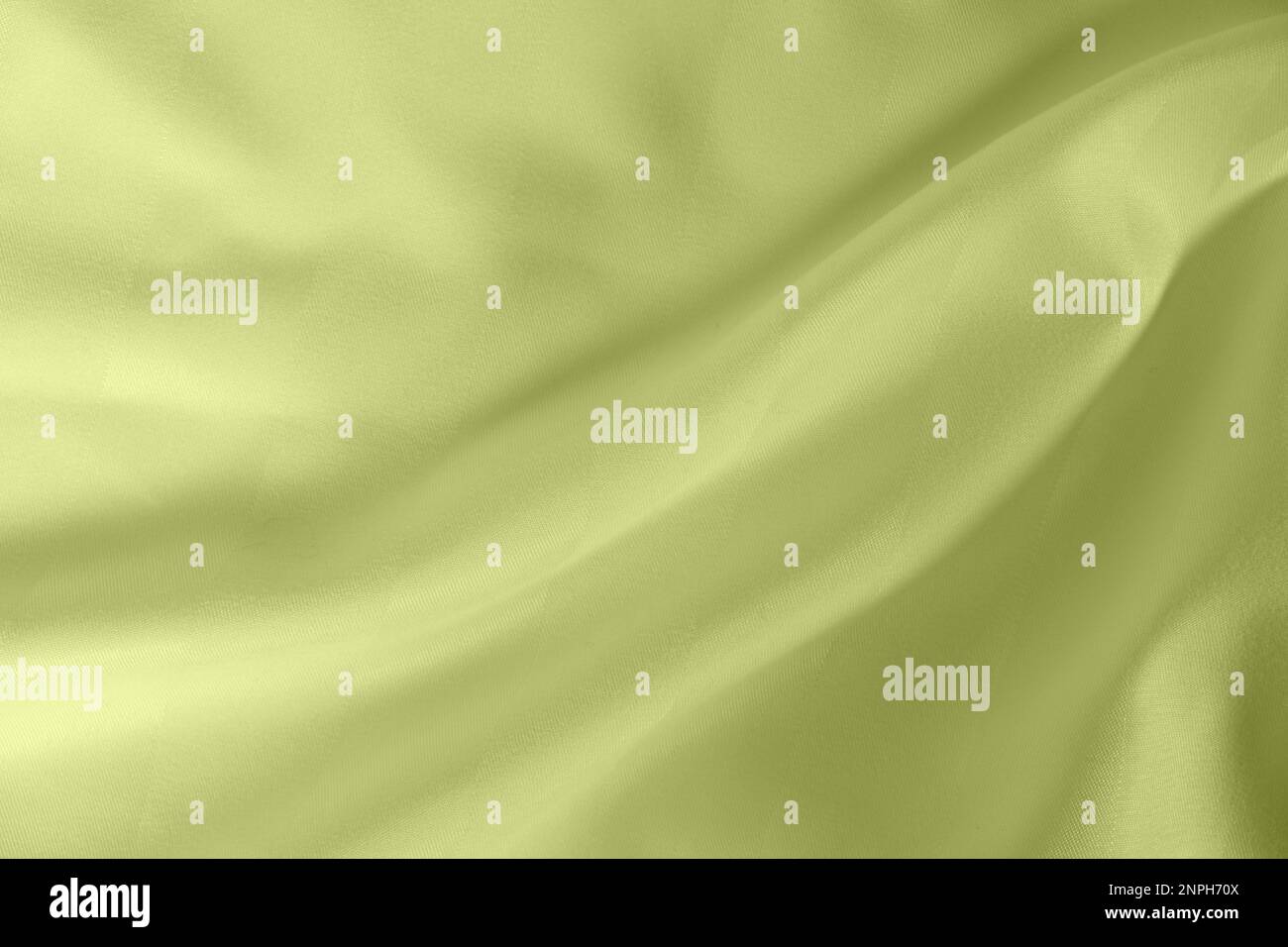 Satin crumpled fabric of light olive color, top view. Natural bed linen ...