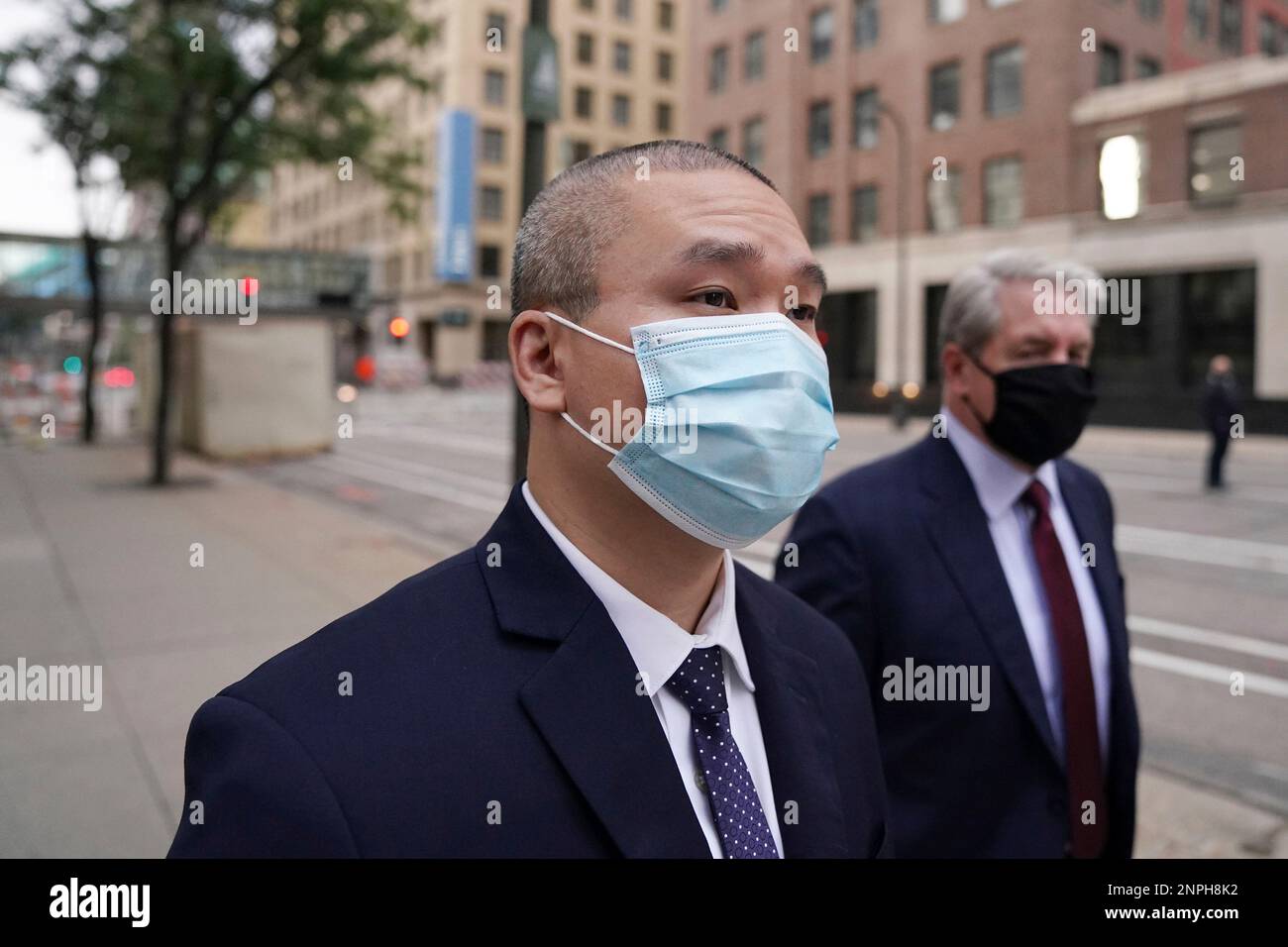 Former Minneapolis police officer Tou Thao arrived with his attorney Robert Paule at the ...
