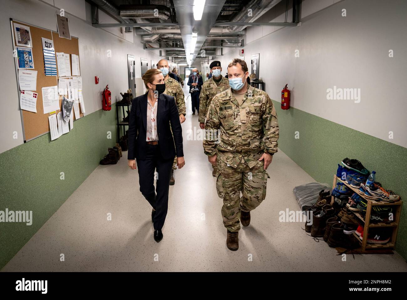 Danish Prime Minister Mette Frederiksen, left, during a visit to the ...
