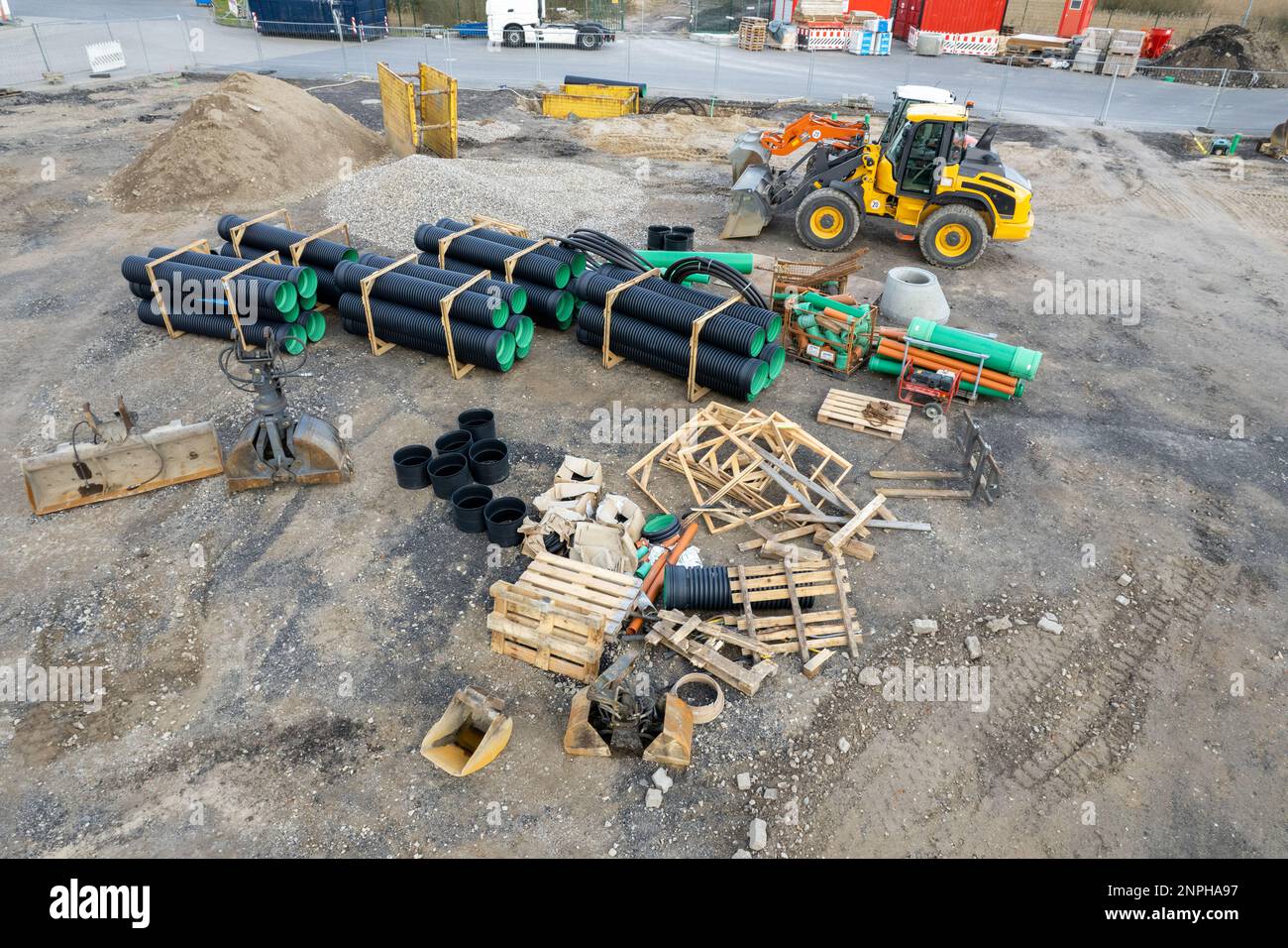 pipes lying on a construction site Stock Photo - Alamy