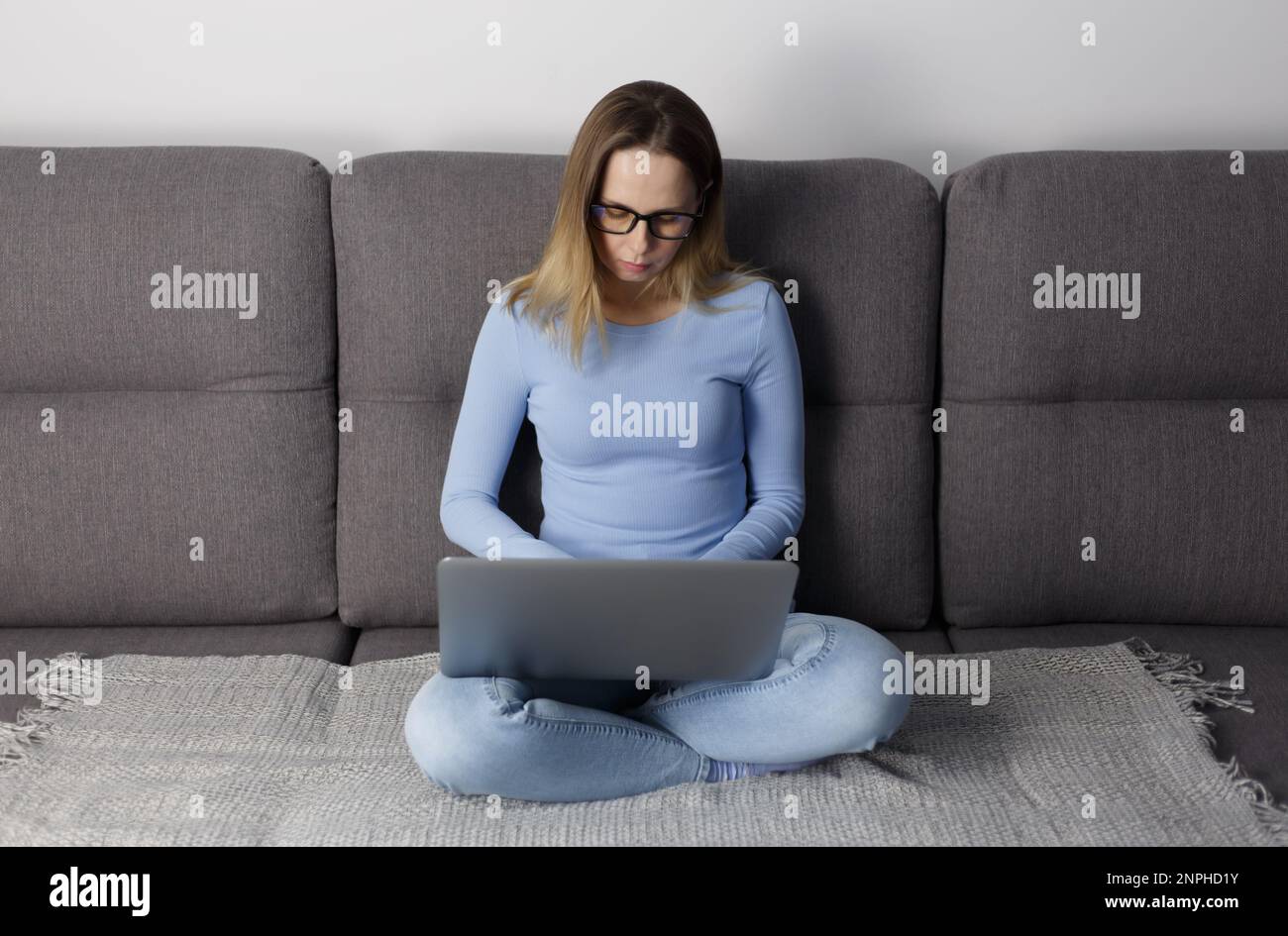 Female programmer coding on laptop. Adult white woman working on silver ... Female programmer coding on laptop. Adult white woman working on silver ...