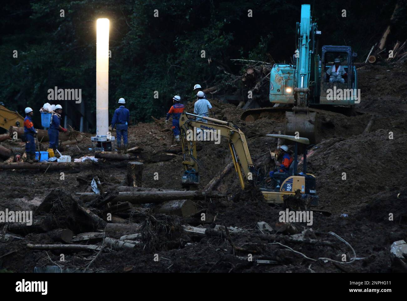 A search operation has continued after dark at a landslide site where ...