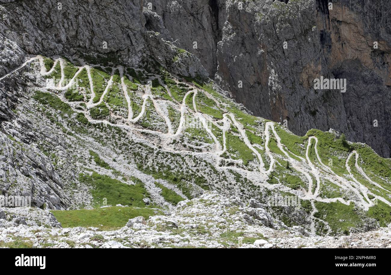 very steep zig zag path going up the dolomites mountain european alps ...