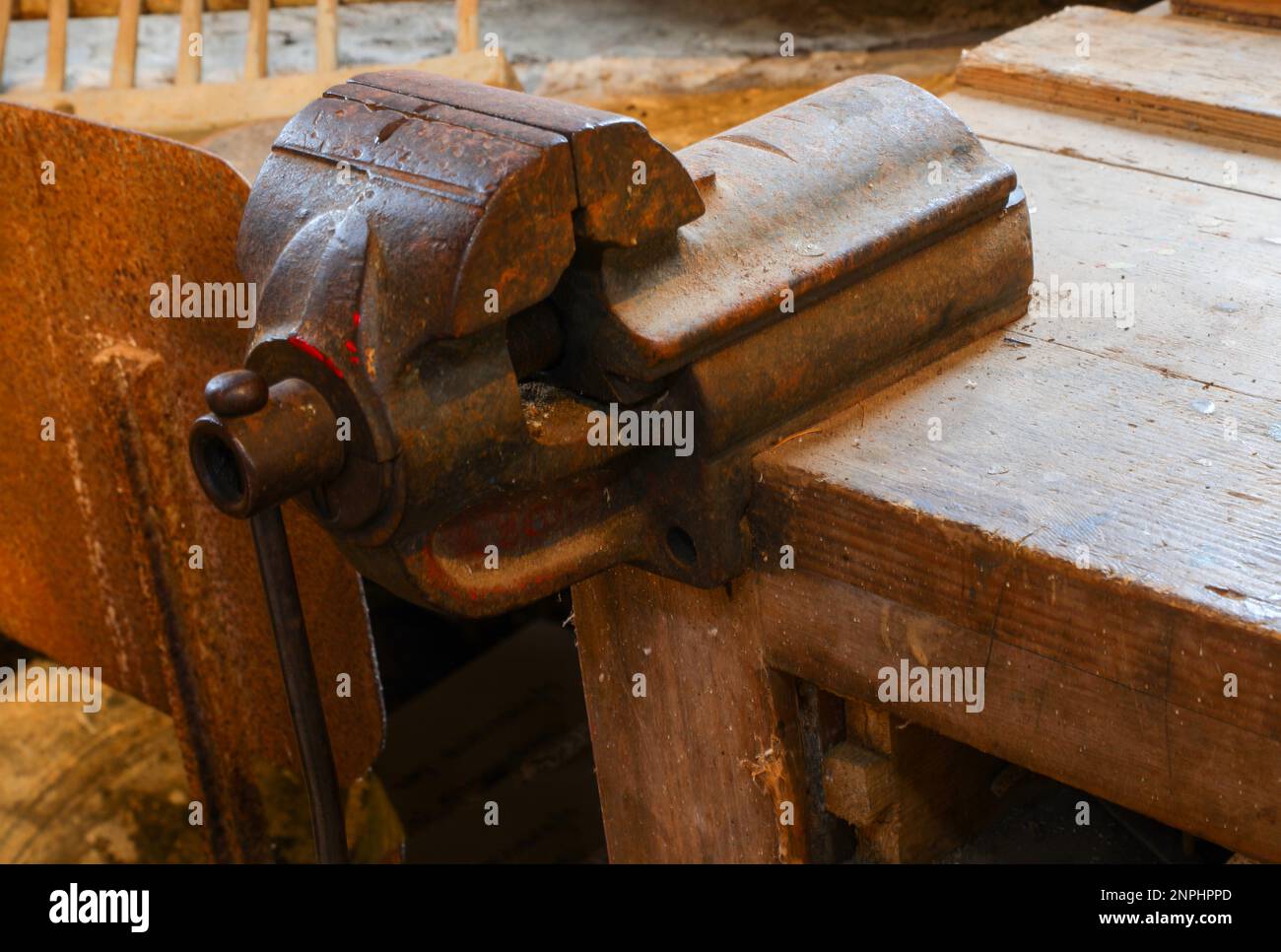 old iron vice in the workbench of an artisan carpentry Stock Photo - Alamy