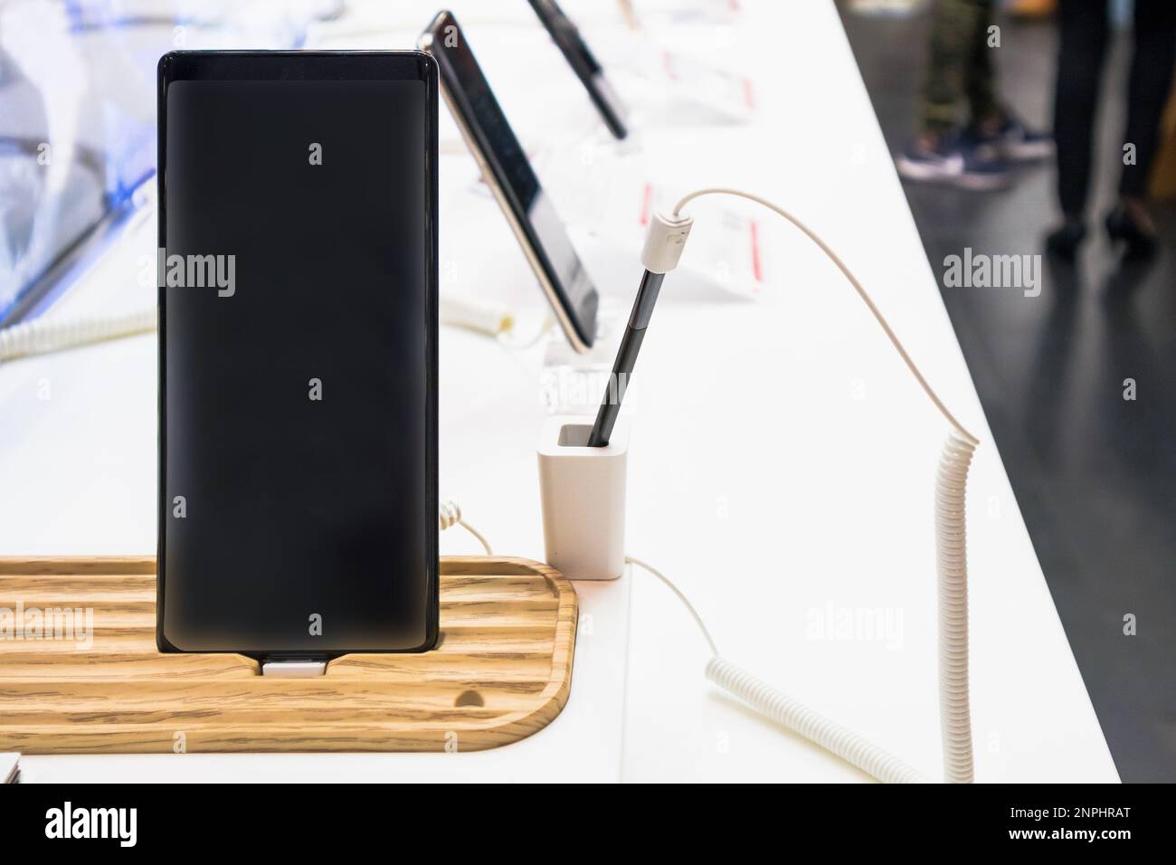 New mobile smartphone show in electronic store, digital gadget for ...
